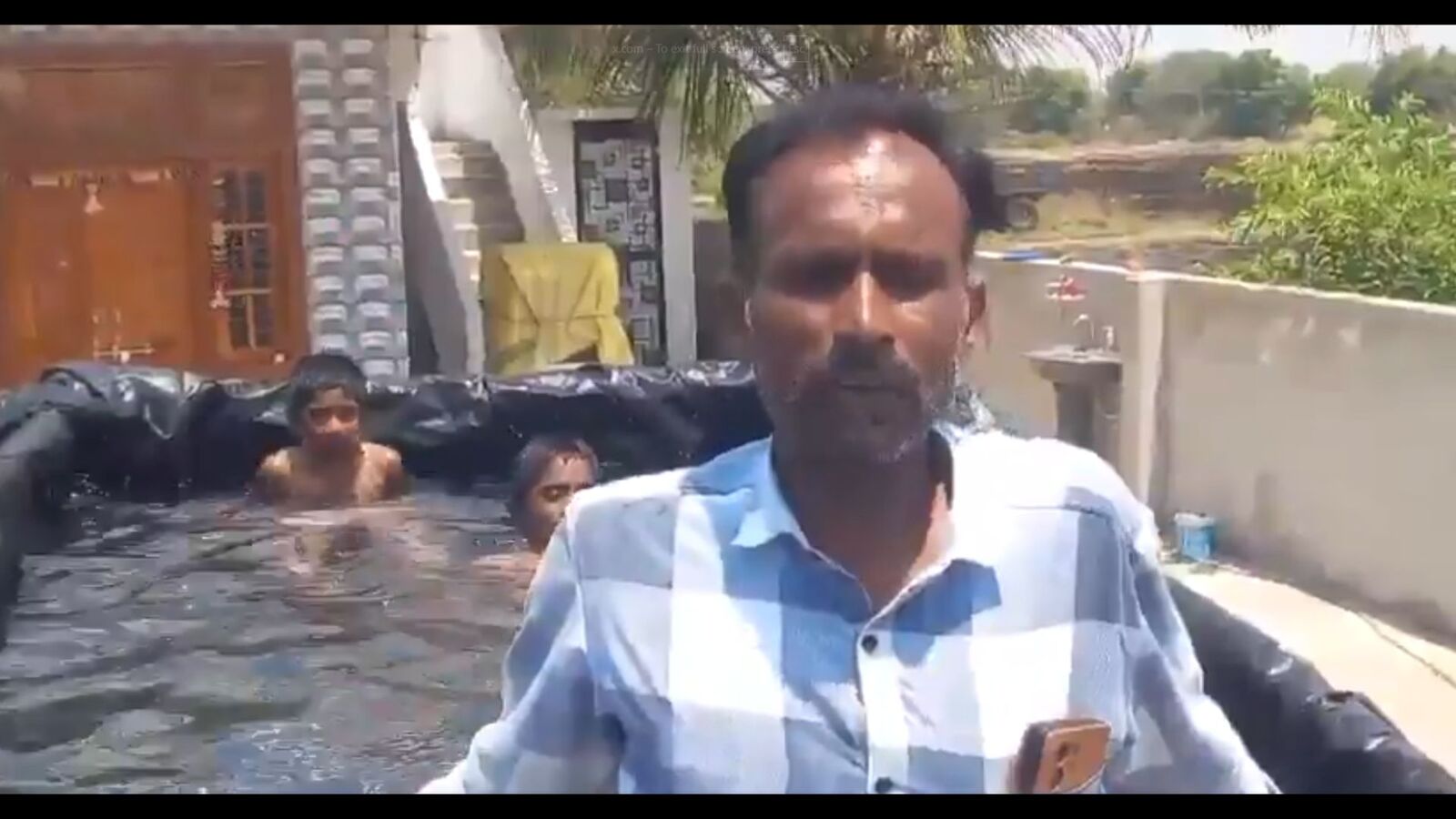Telangana man turns tractor trolley into swimming pool to beat summer heat